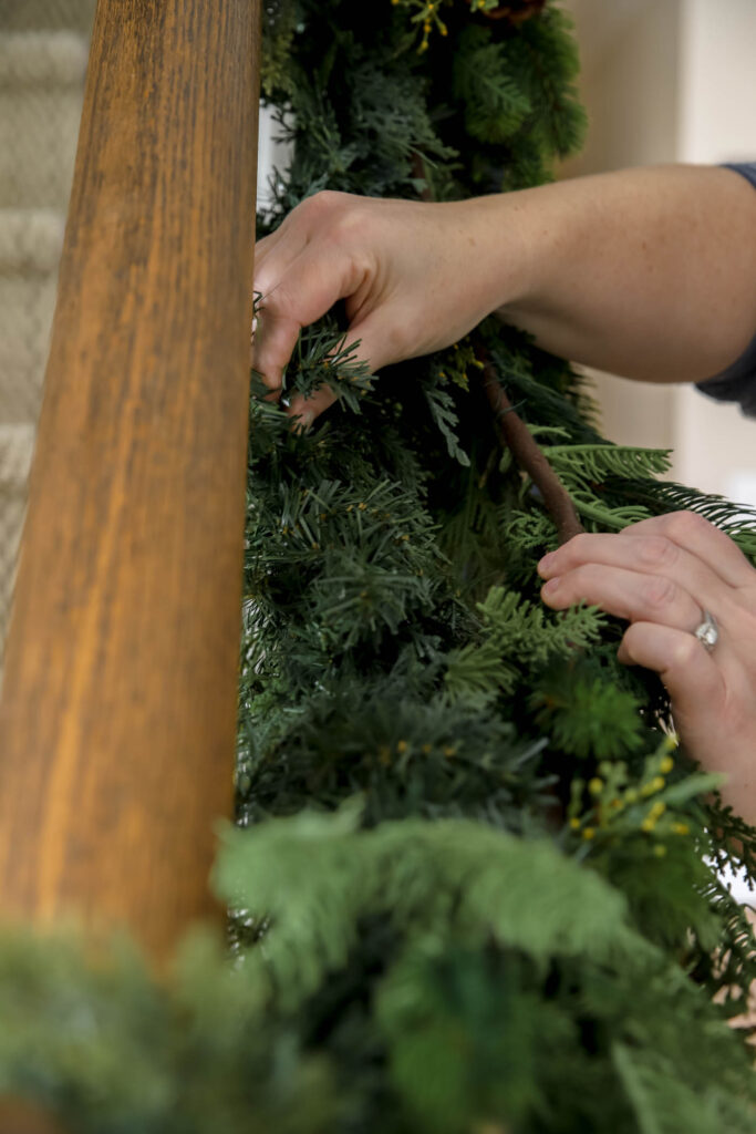 How to Hang Garland on the Stairs (step-by-step guide)